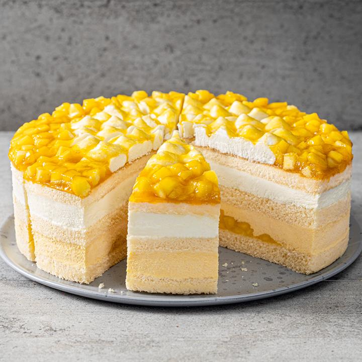 UNSERE PRACHTSTÜCKE Mango-Vanille-Torte, vorgeschnitten | FRONERI Schöller